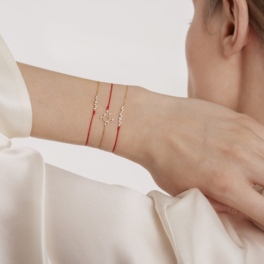 Ruifier 18ct yellow gold Scintilla Deca Ray 10 diamond red cord and ch ...